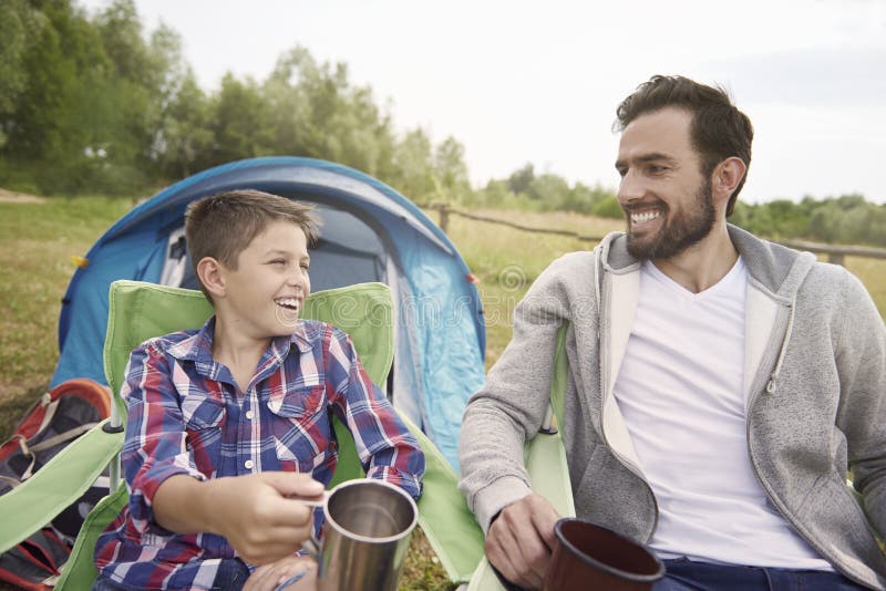 Enjoying camping stock image. Image of sitting, hiking - 58845301