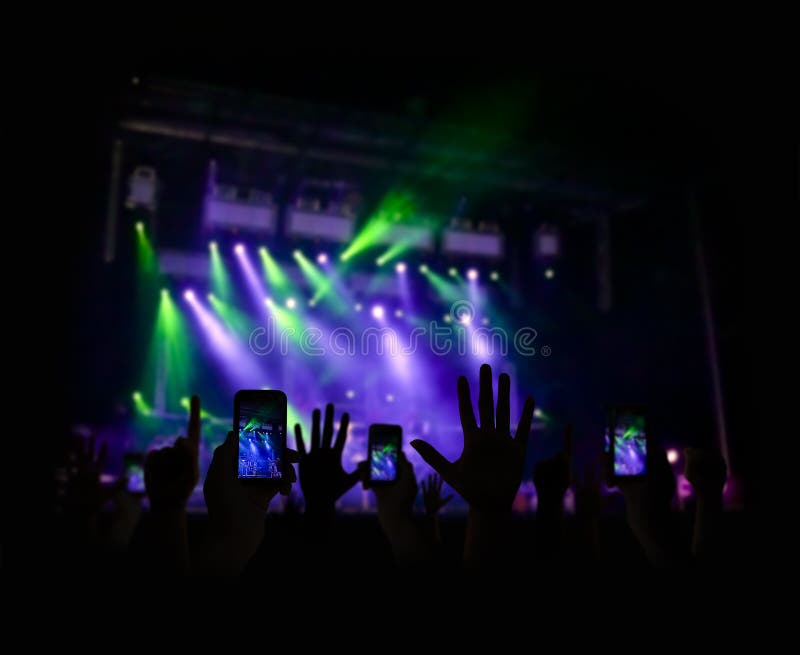 Enjoying a concert stock image. Image of male, lighting - 44300725