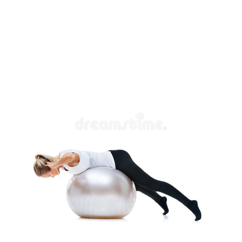 Enjoying a Full Body Workout. a Woman Balancing on an Exercise Ball ...