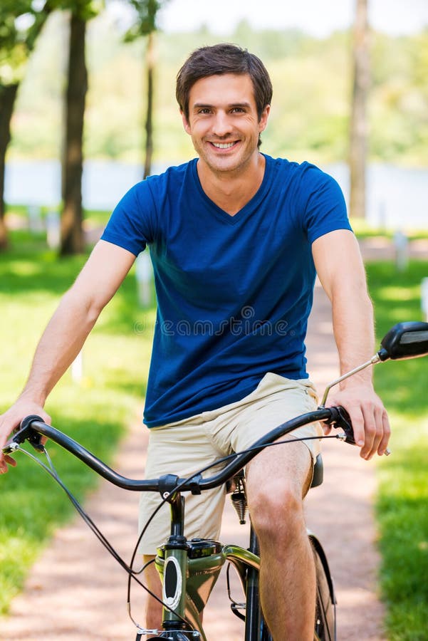 Young Man Ride a Bike in Autumn Park Stock Photo - Image of healthy ...
