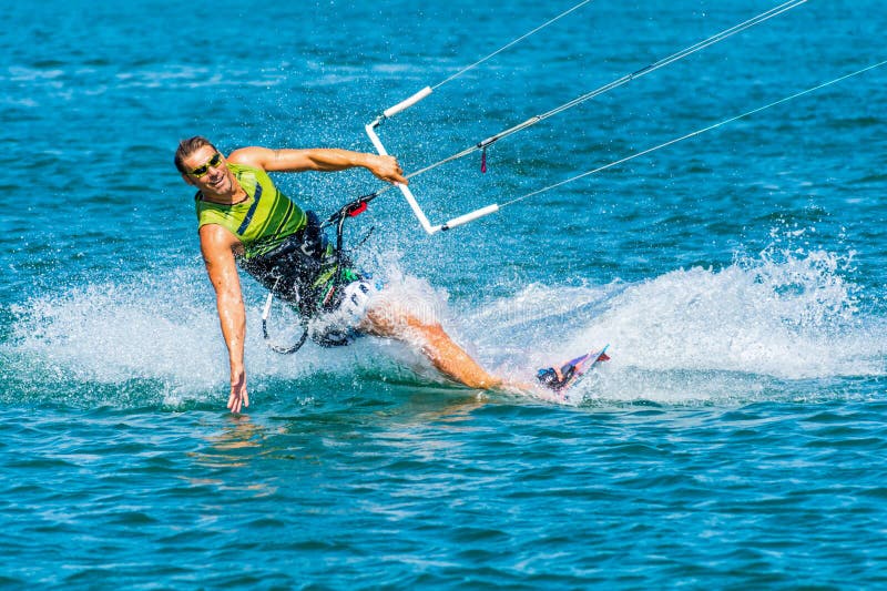 Enjoying kiting in the sea stock image. Image of sports - 48975733