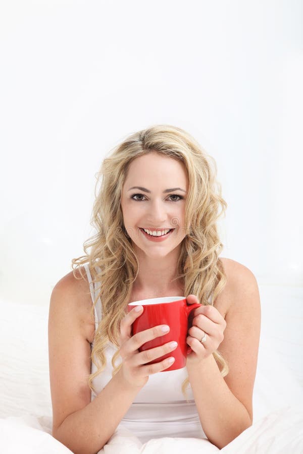 Enjoying A Mug Of Coffee In Bed Stock Image - Image of blonde, bedroom ...