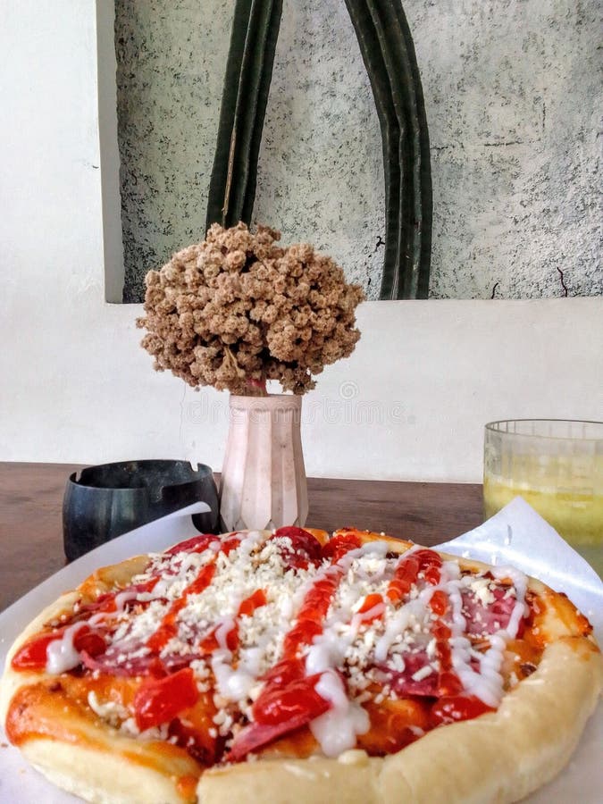 Enjoying Pizza while Waiting for What is Awaited Stock Image - Image of ...