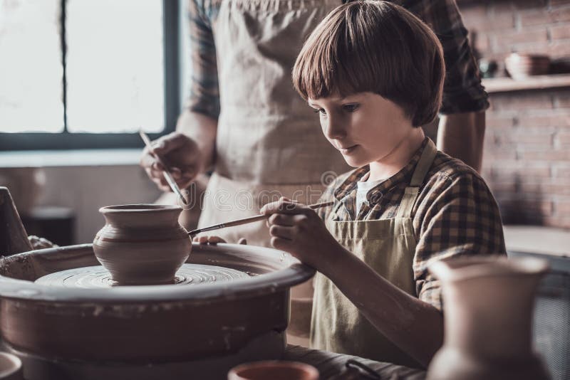 Enjoying pottery class. stock photo. Image of making - 79727576