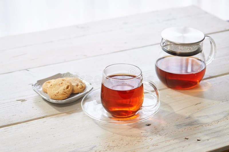 Enjoying Tea at a Table by the Window Stock Photo - Image of people ...