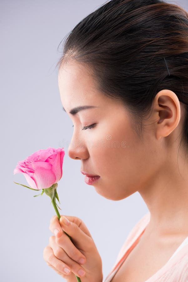 Enjoying scent of flower stock image. Image of aroma - 51361065