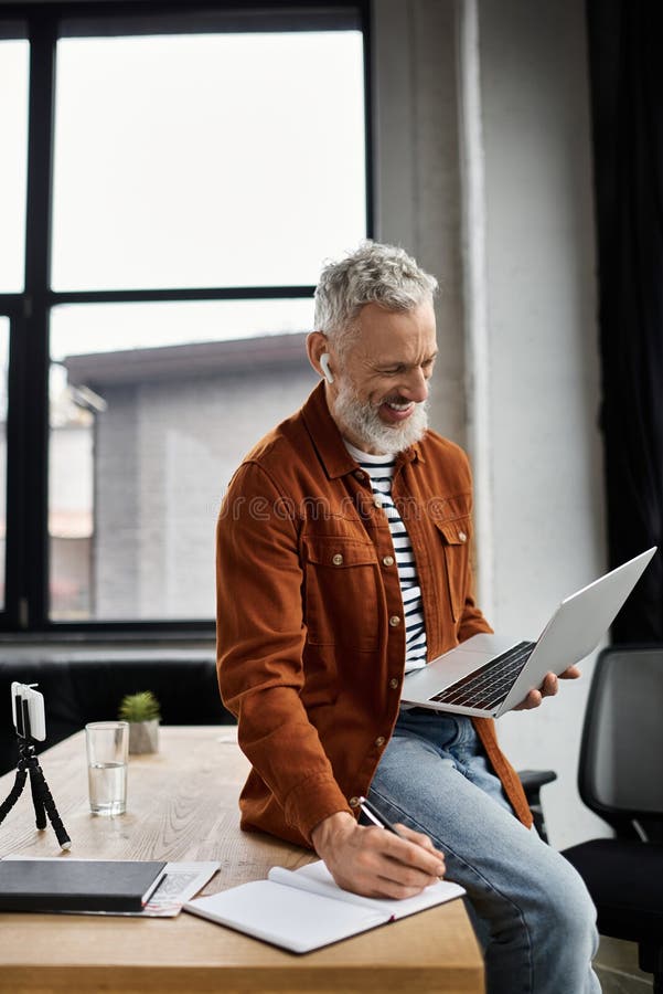 Enjoying Work Moments while Balancing Technology Stock Photo - Image of ...