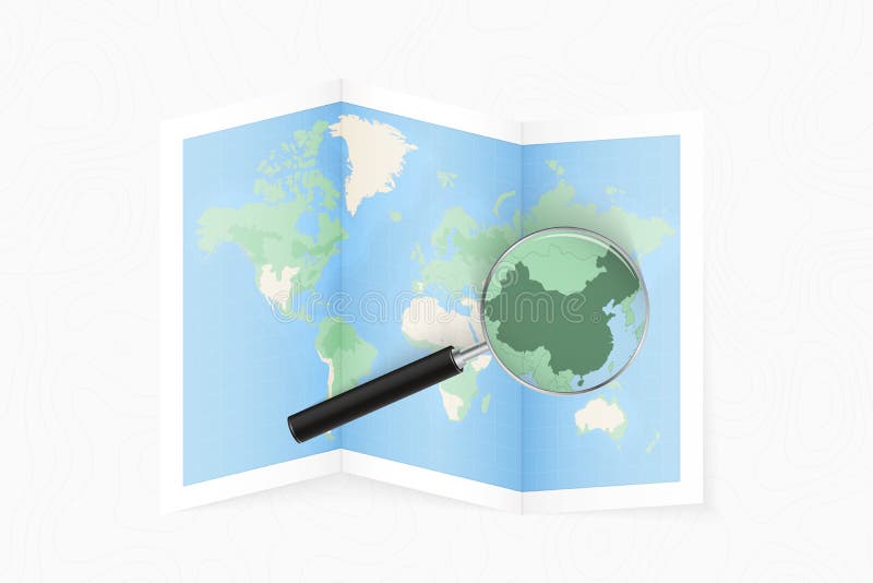 Enlarge China with a Magnifying Glass on a Folded Map of the World ...