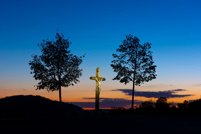 Two trees and a crucifix stock photo. Image of religion - 147857506