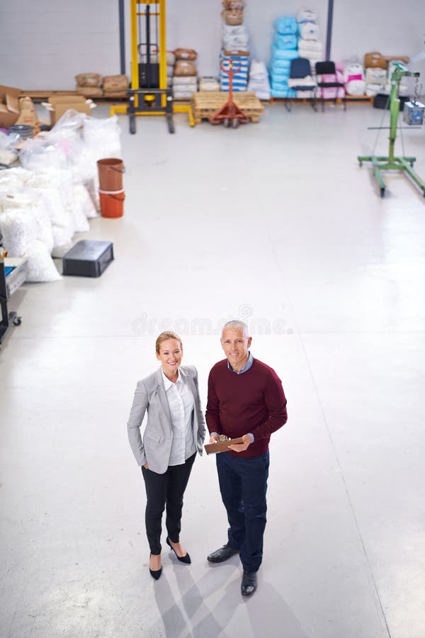 Ensuring Efficiency. High Angle Portrait of Two Factory Managers Doing ...