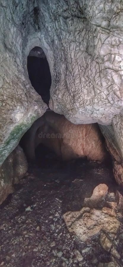 Enter to the cave stock photo. Image of rock, formation - 238486468