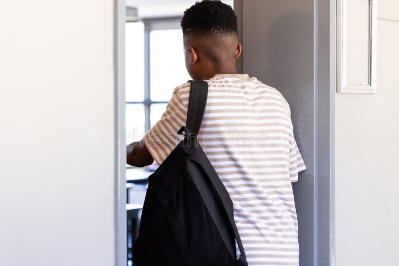 Entering Classroom, Student with Backpack Walking through School Door ...