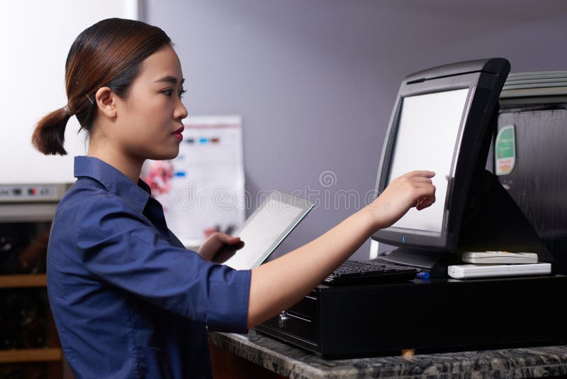 Entering order details stock photo. Image of employee - 130431928
