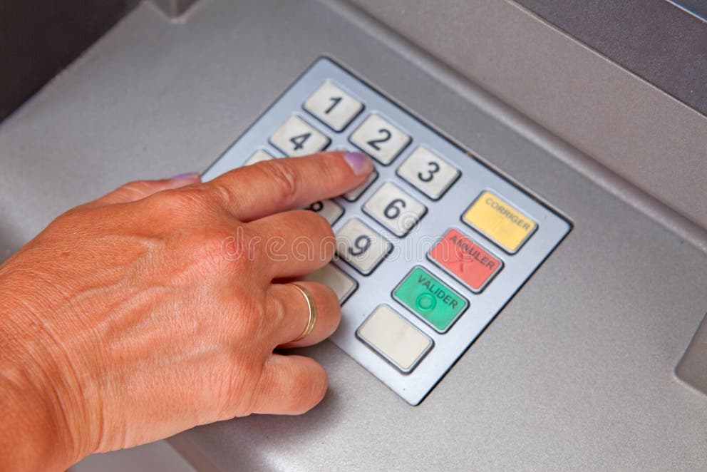 Entering Personal Identification Number on ATM Stock Image - Image of ...