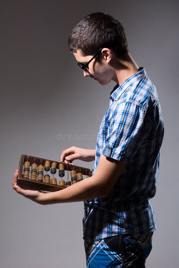 Enterprising Young Man with an Abacus. Stock Photo - Image of clothing ...