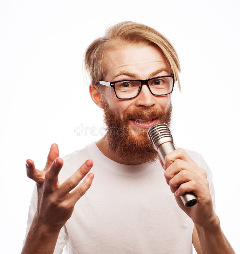 The Entertainer. Young Elegant Talking Man Holding Microphone, Isolated ...