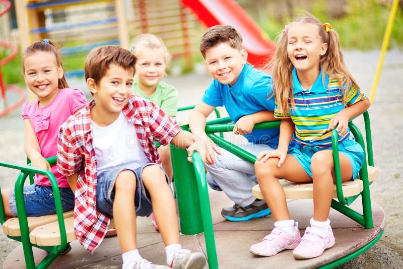 Happy Friends Kids Having Fun Roundabout Playground Stock Photos - Free ...