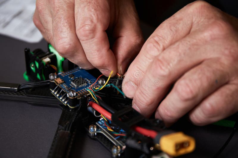 Enthusiast Assembles Complex Drone Components Inside Stock Photo ...