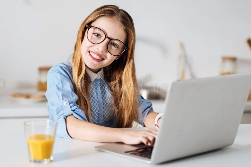 Enthusiastic Bright Girl Typing on Her Laptop Stock Photo - Image of ...