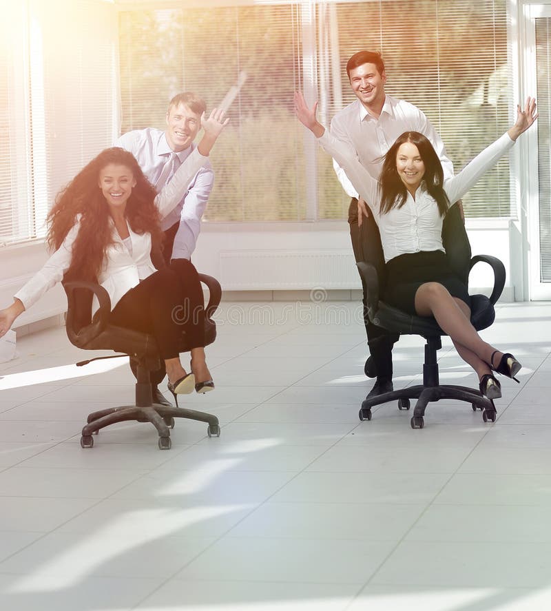 Enthusiastic Business Team in Office Stock Photo - Image of crossed ...