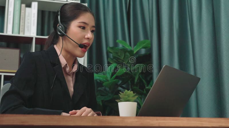 Enthusiastic Female Operator Provide Helpful Customer Service To ...