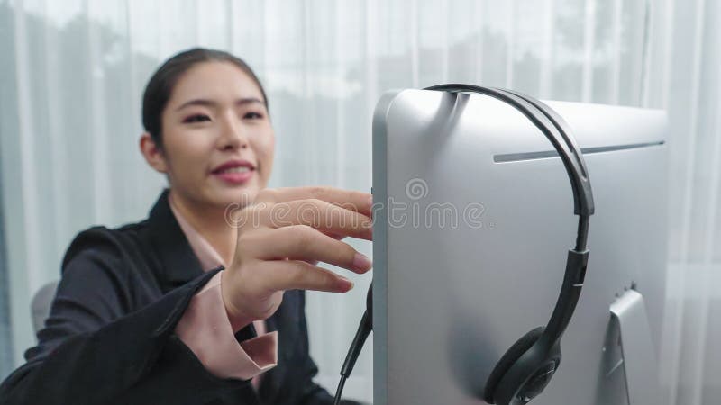 Enthusiastic Female Operator Provide Helpful Customer Service To ...