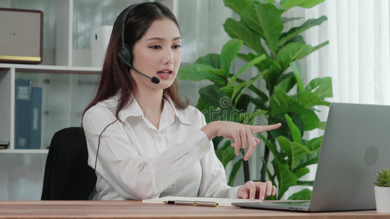 Enthusiastic Female Operator Provide Helpful Customer Service To ...