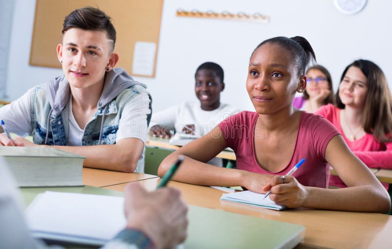 Enthusiastic Girls and Boys Taking the Notes while Stock Photo - Image ...