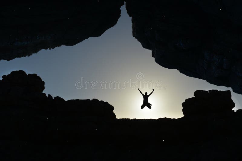 Enthusiastic Jump of Happy Explorer in Mysterious Caves Stock Photo ...