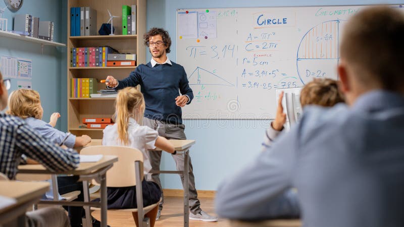 Enthusiastic Teacher Explains Lessons and Asks Questions from a ...