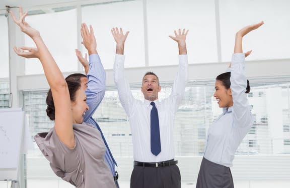 Enthusiastic Work Team Cheering Together Stock Image - Image of ...