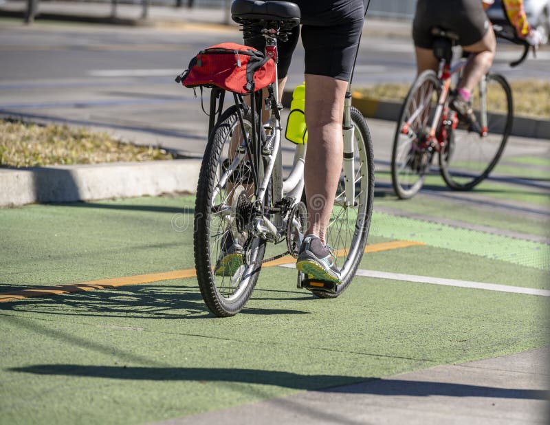 Enthusiasts Ride Bicycles One after Another Along the Cycle Path Stock ...