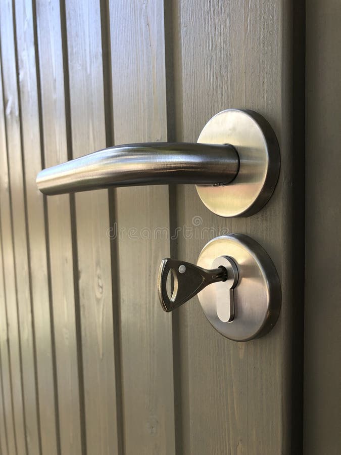 Key Inserted into the Keyhole Stock Image - Image of open, house: 338716421