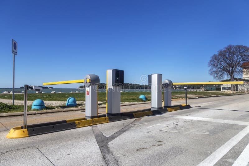 Driveway Exit with Ticketing Machine Stock Image - Image of driveway ...