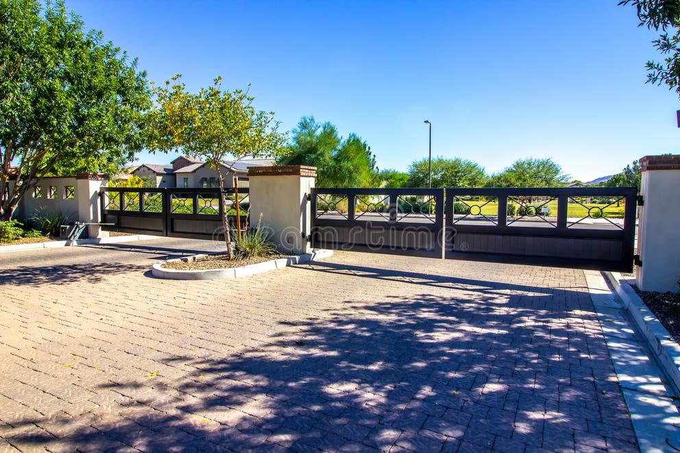 Entrance and Exit Gates To Secure Subdivision Stock Image - Image of ...