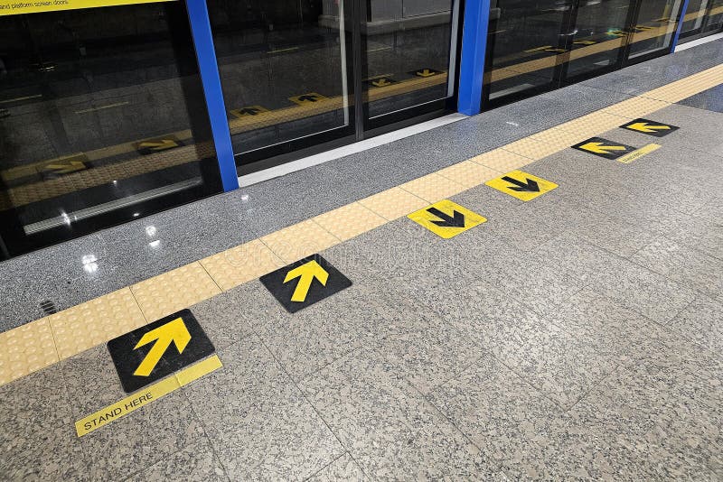 Entrance and Exit Sign on the Train Platform Ground. Stock Photo ...