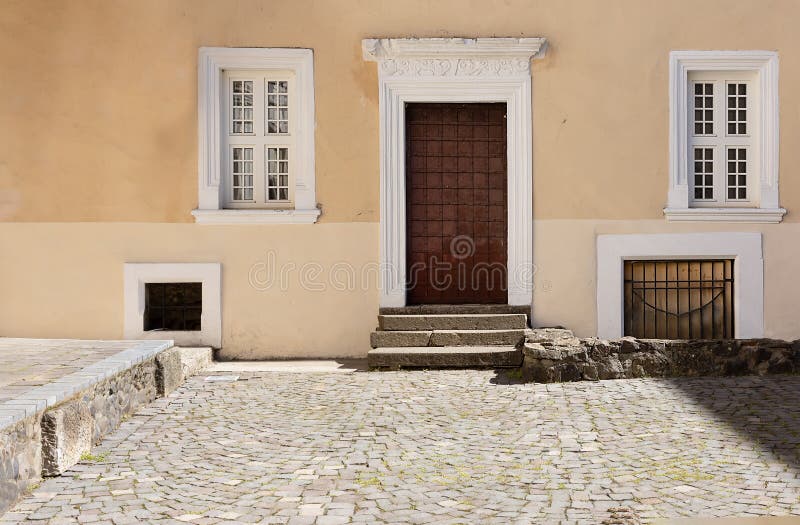 Entrance with an Old Front Door and Two Windows Stock Image - Image of ...
