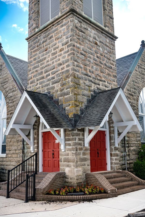 Entrance Red Doors To a Large Stone Church Stock Photo - Image of ...