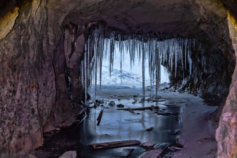 Entrance To Ice Cave is Hung with Large Icicles Stock Image - Image of ...