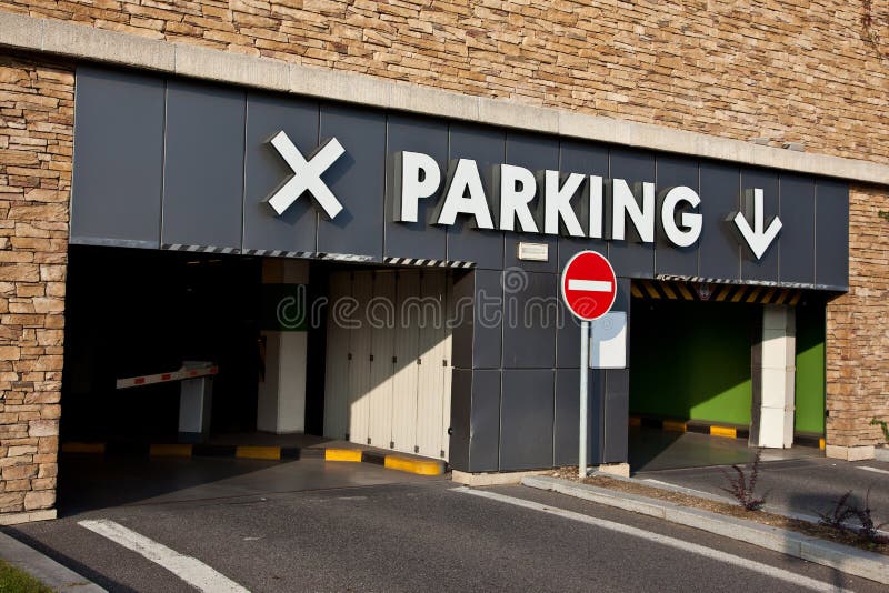 Entrance to parking stock photo. Image of motorism, covered - 21341376