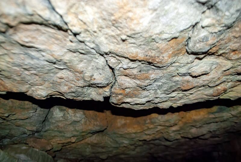 Entrance to a small cave stock image. Image of mountain - 232383977