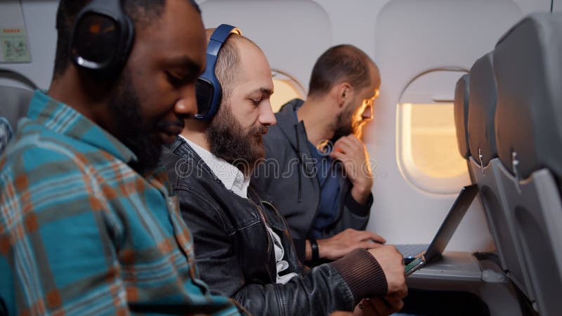 Entrepreneur Browsing Internet on Smartphone during Flight Stock Photo ...