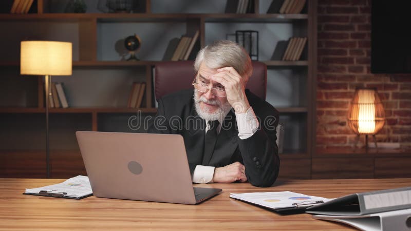 Entrepreneur Getting Upset while Staring at Computer at Work Stock ...