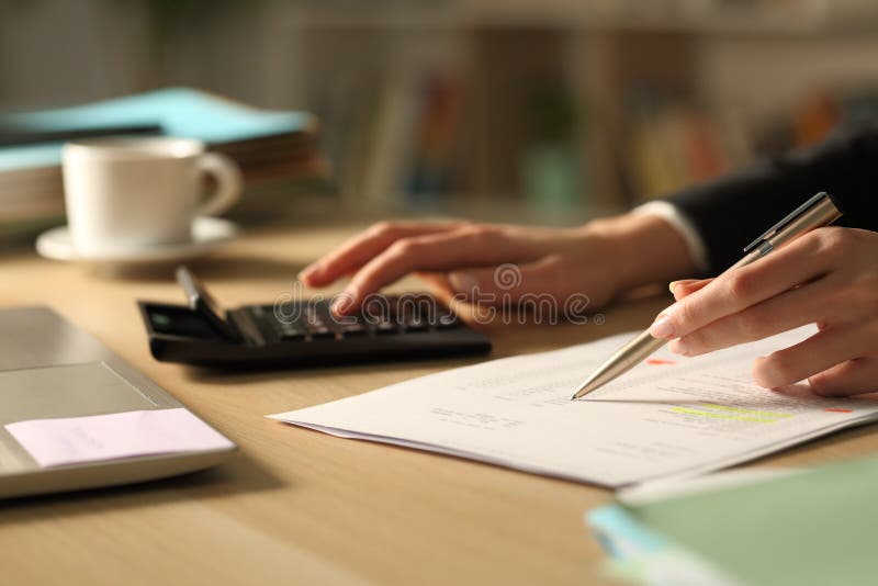 Entrepreneur Hands Checking Document Using Calculator at Night Stock ...