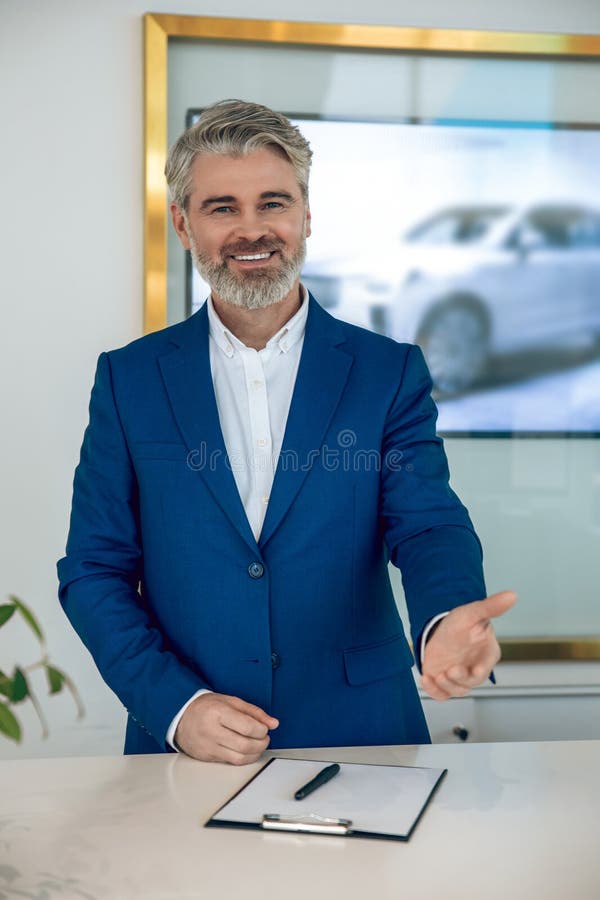 Entrepreneur in Modern Office Presenting Digital Data on Large Screen ...