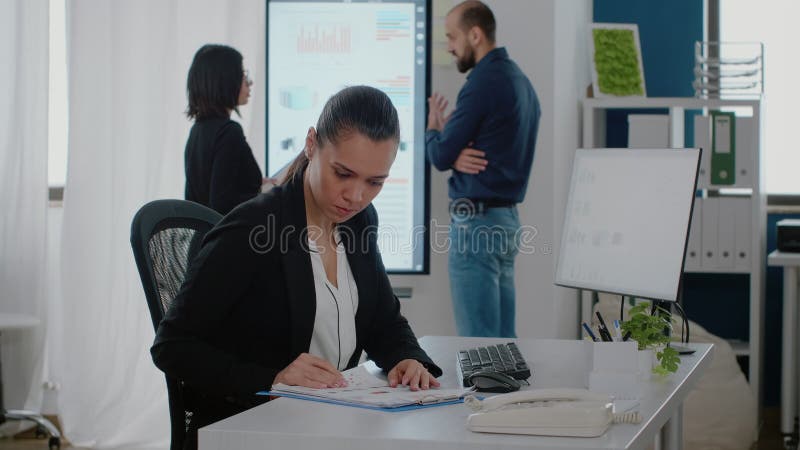 Entrepreneur Working with Computer and Documents for Project Stock ...
