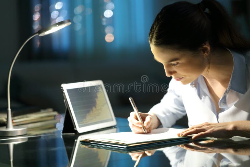 Entrepreneur Working in the Night Taking Notes Stock Photo - Image of ...