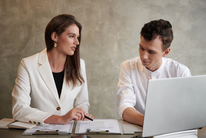 Entrepreneurs Discussing CV of Applicant Stock Photo - Image of ...