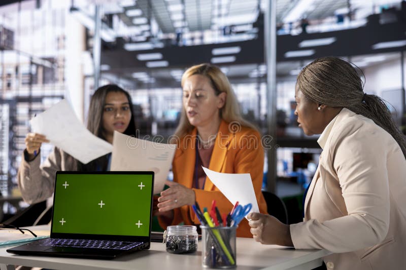 Entrepreneurs Team with a Success Story Work Next To Green Screen Stock ...