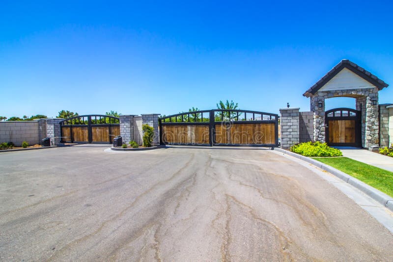 Entry/Exit Automatic Wooden Gates with Separate Pedestrian Gate Stock ...